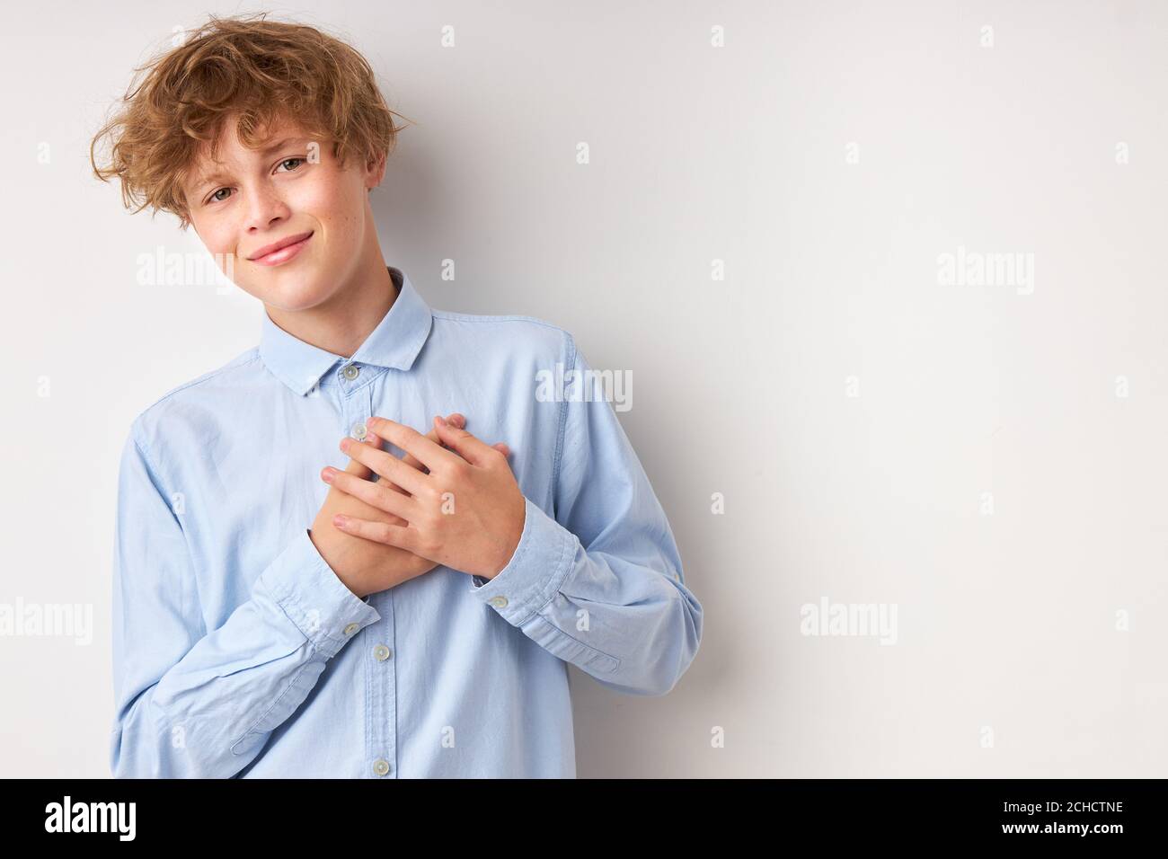 grateful child boy say thanks at camera, caucasian freckled boy look at ...