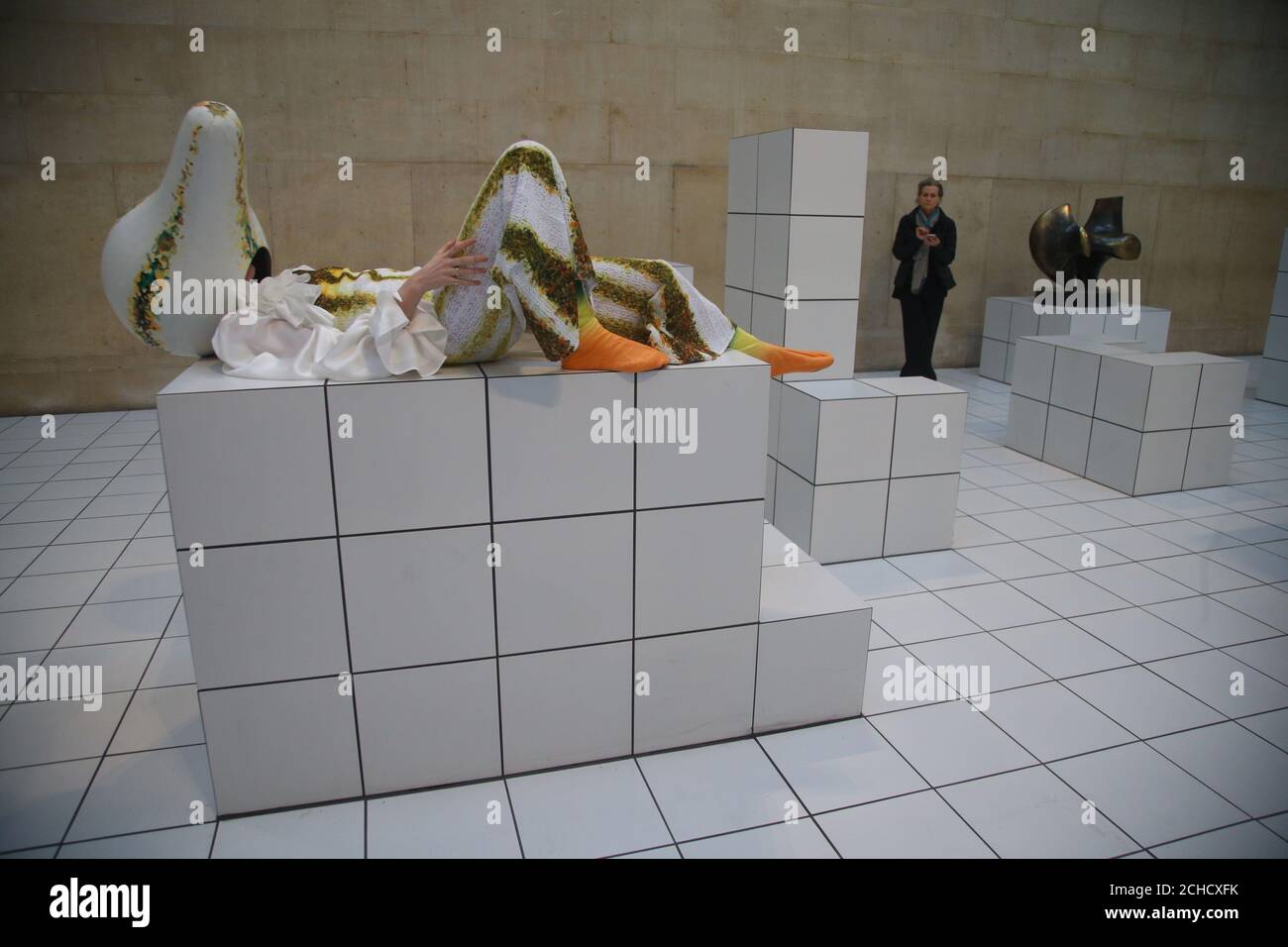 A woman views a work by artist Anthea Hamilton's titled The Squash, an ...