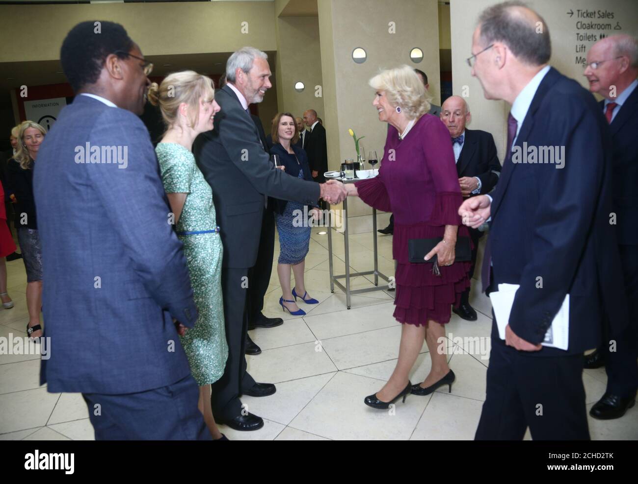 The Duchess of Cornwall meets royal correspondents (left to right) Alan ...
