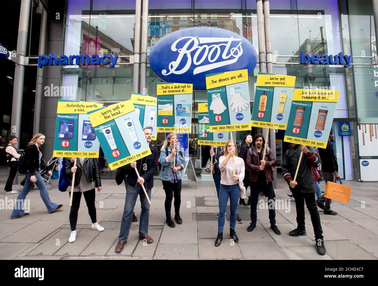 EDITORIAL USE ONLY Campaigners outside Boots' flagship on Oxford Street ...