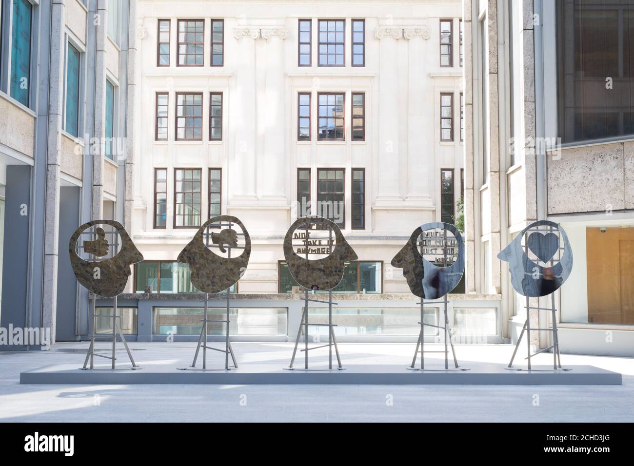 EDITORIAL USE ONLY Sculptures of mirrored heads by Swiss artist Olaf ...