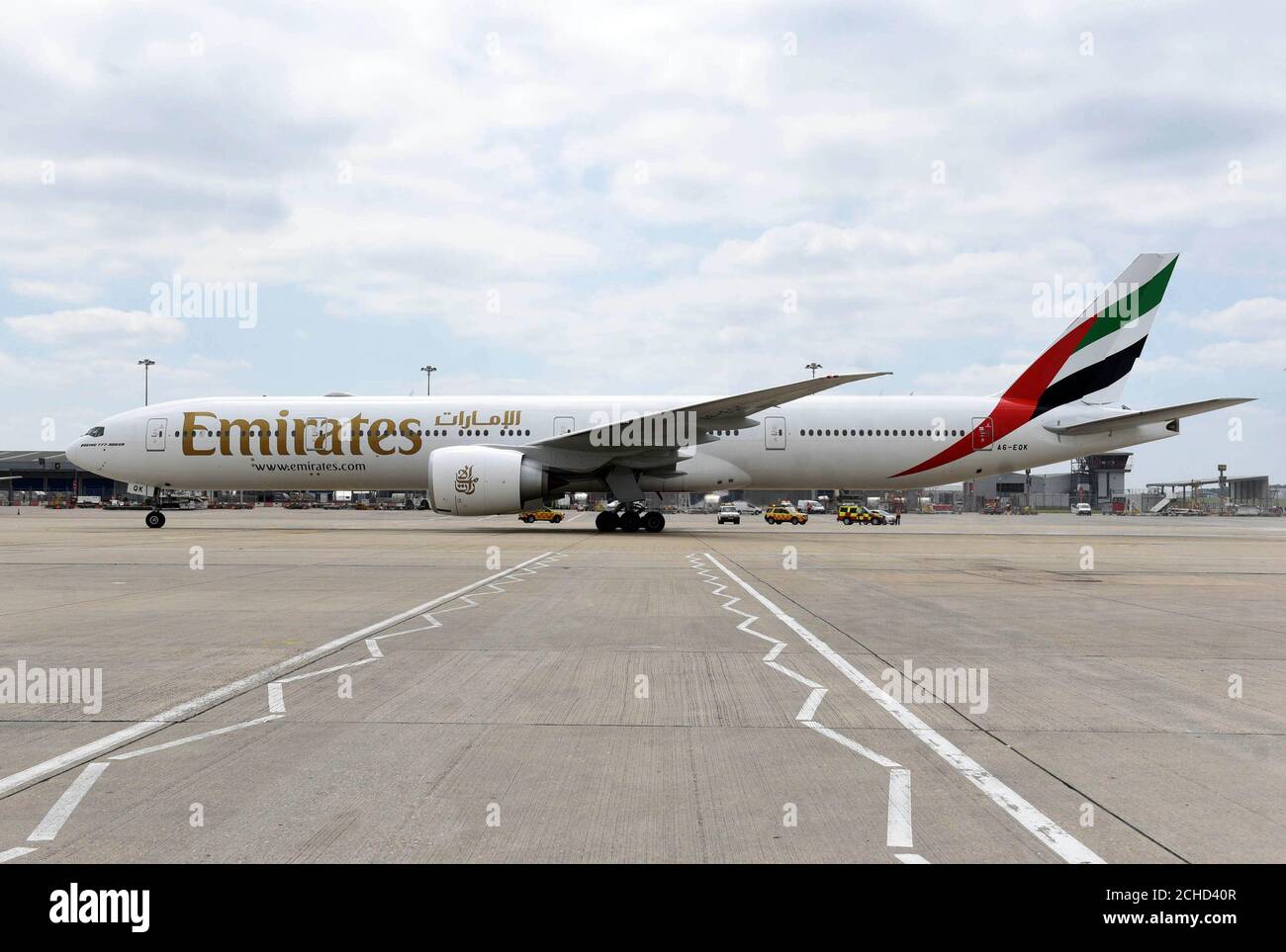 EDITORIAL USE ONLY An Emirates Boeing 777, EK 033, touches down in ...