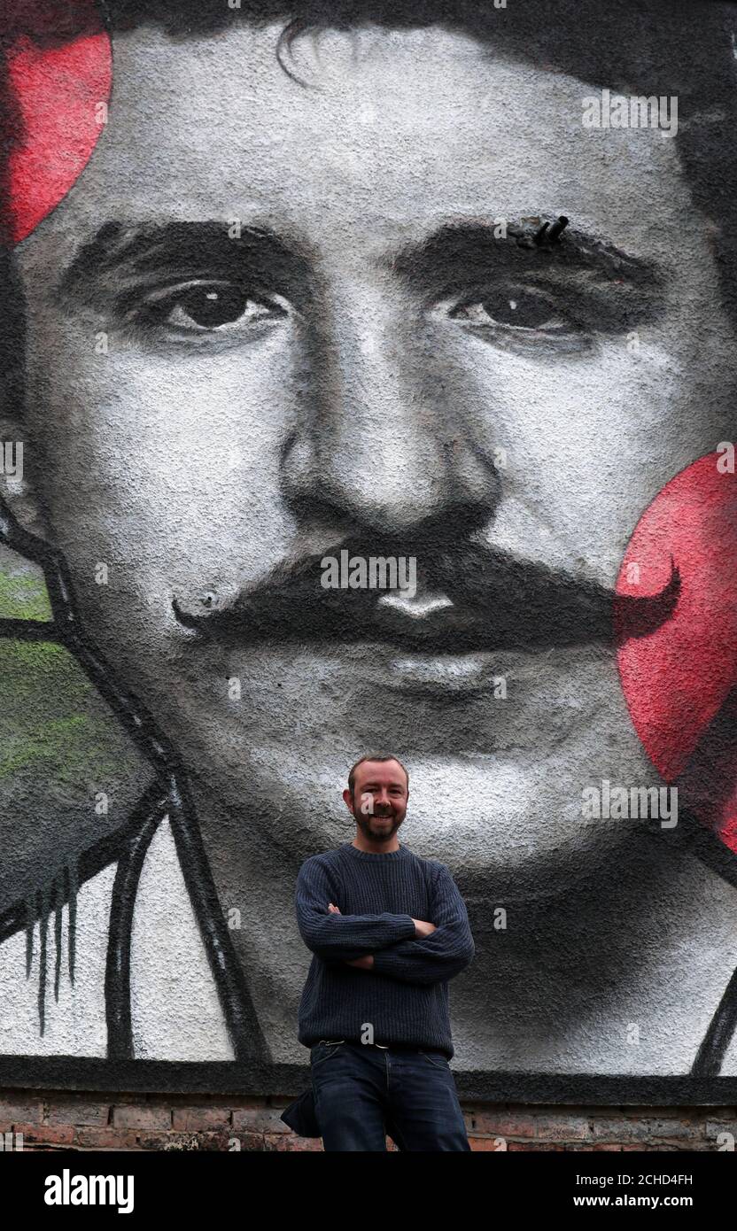 Artist Bobby McNamara known as Rogue-one views his latest work, a giant ...