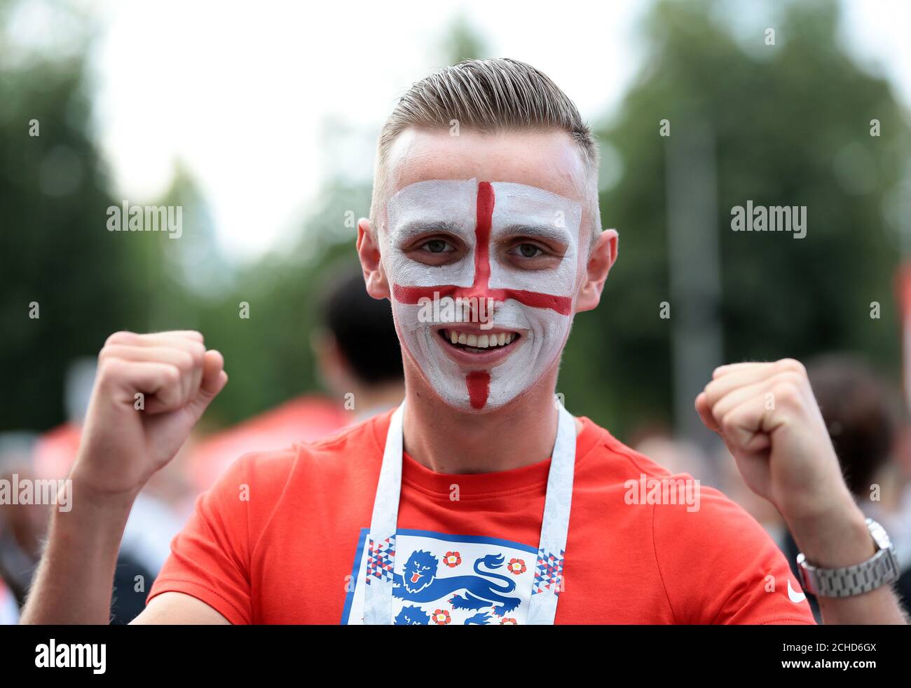 An England fan wearing face paint of the St George's Flag ahead of the ...