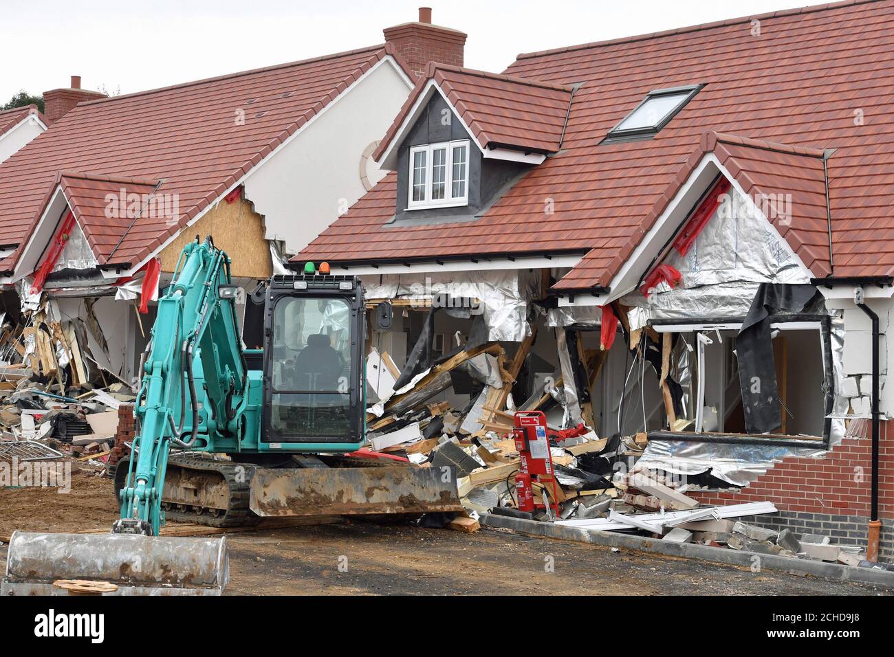 Damaged properties in a row of newly-built retirement homes in Ermine ...