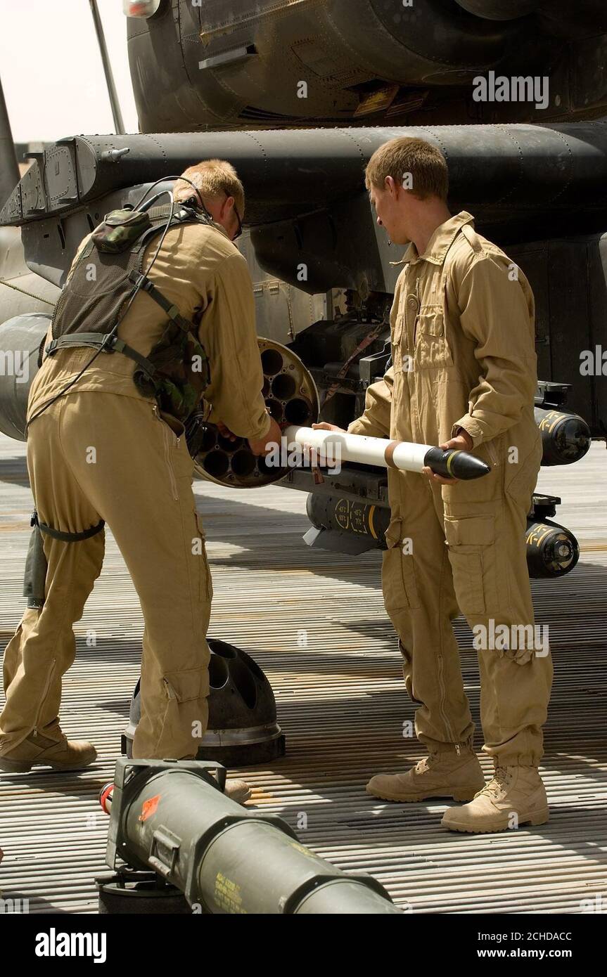 British Army Air Corps Ground Crew re-load a 2.75-inch rocket launcher ...
