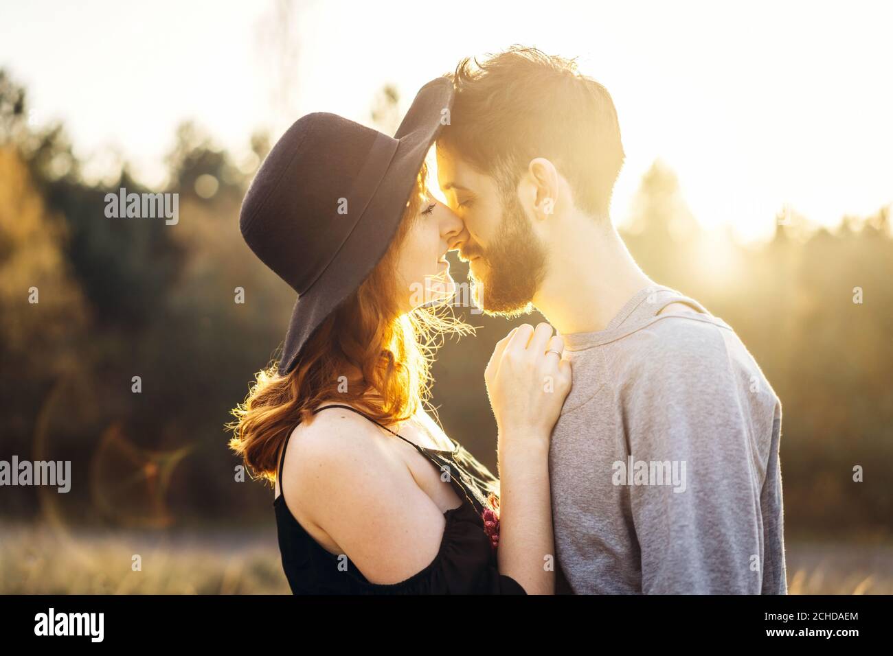 Pretty young romantic couple spend time together outdoor Stock Photo ...