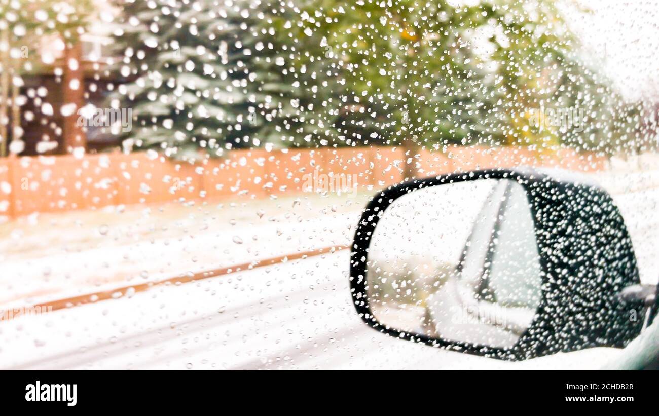 Driving in typical North American suburbs during the first snowstorm of ...