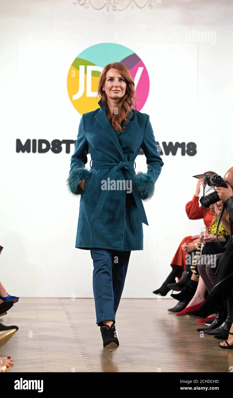 EDITORIAL USE ONLY Angela Dunn walks the JD Williams Midster catwalk in ...