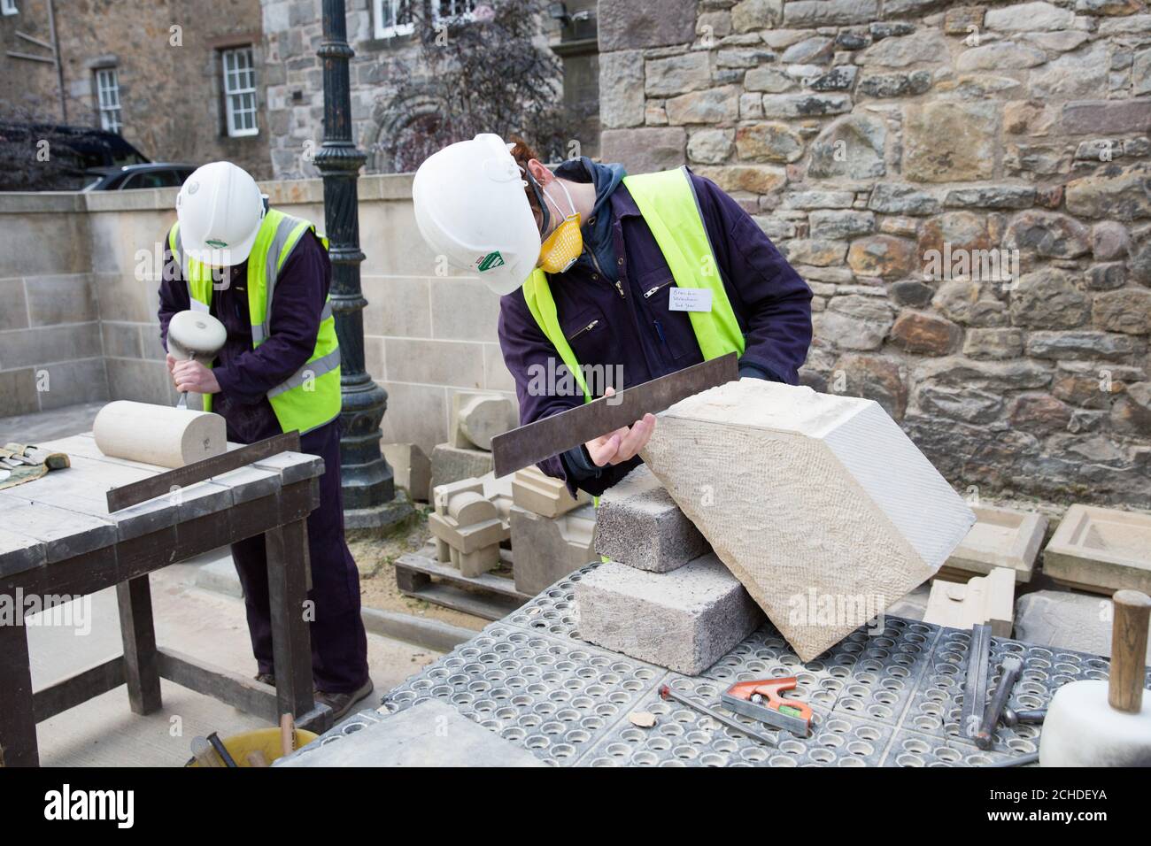 Stonemason apprentices working outside St Mary's Episcopal Cathedral ...