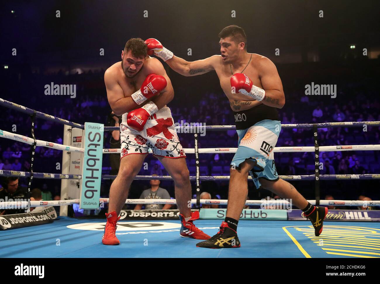 David Allen (left) and in action against Ariel Esteban during their ...