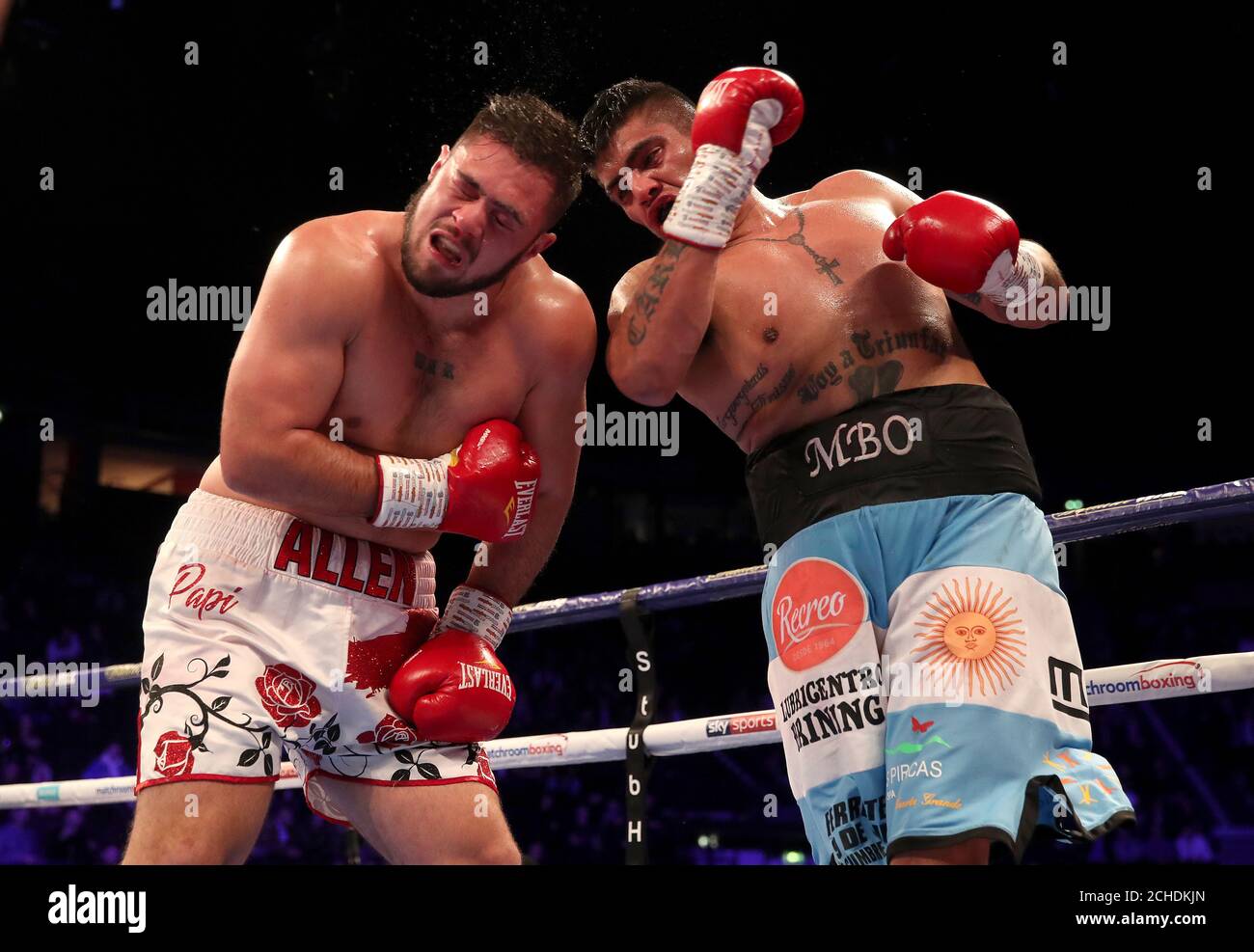 David Allen (left) and in action against Ariel Esteban during their ...
