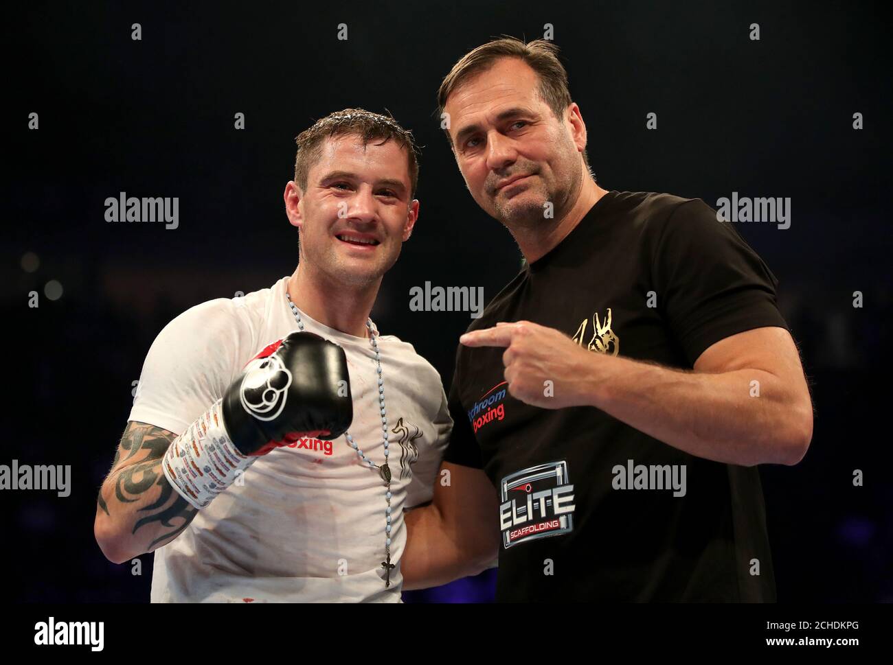 Ricky Burns (left) with trainer Tony Simms after victory over Scott ...