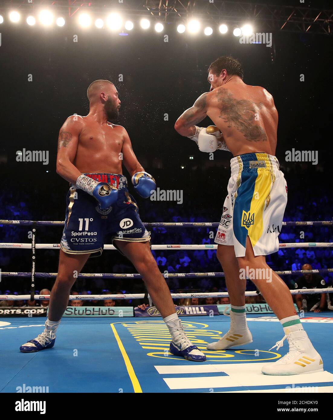 Tony Bellew (left) in action against Oleksandr Usyk during their WBC, WBA, IBF, WBO & Ring ...
