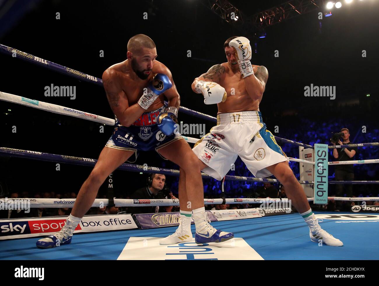 Tony Bellew (left) in action against Oleksandr Usyk during their WBC ...