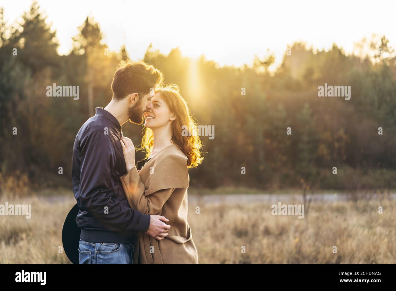 Pretty young romantic couple spend time together outdoor Stock Photo ...