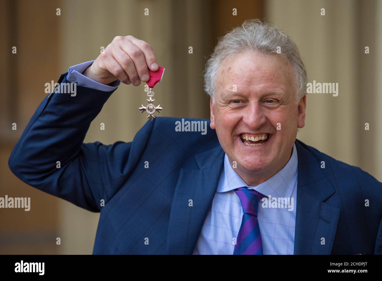 Owner of the Oldest Sweet Shop, Keith Tordoff, with his MBE medal which ...
