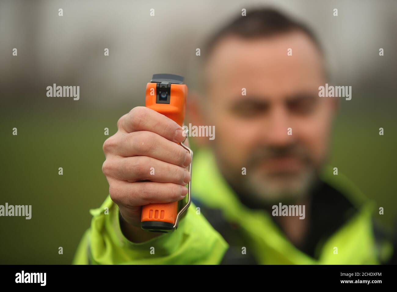 A member north yorkshire police demonstrates selectadna tagging spray ...