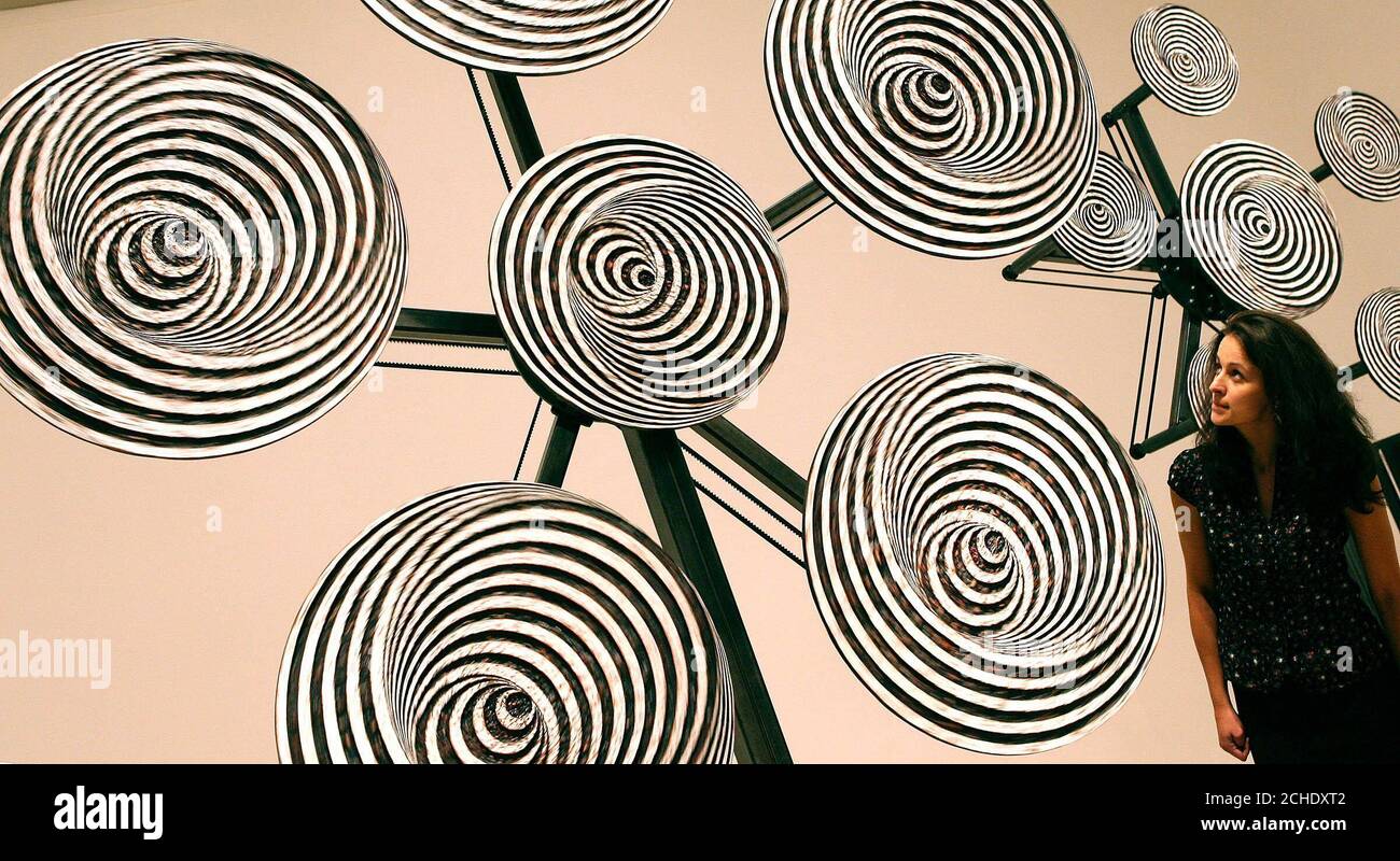 A woman looks at Artist Mark Titchner's Turner Prize nominated work ...