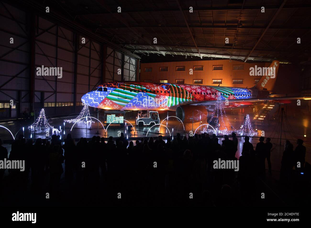 EDITORIAL USE ONLY A Christmas light show illuminates an easyJet A320 ...