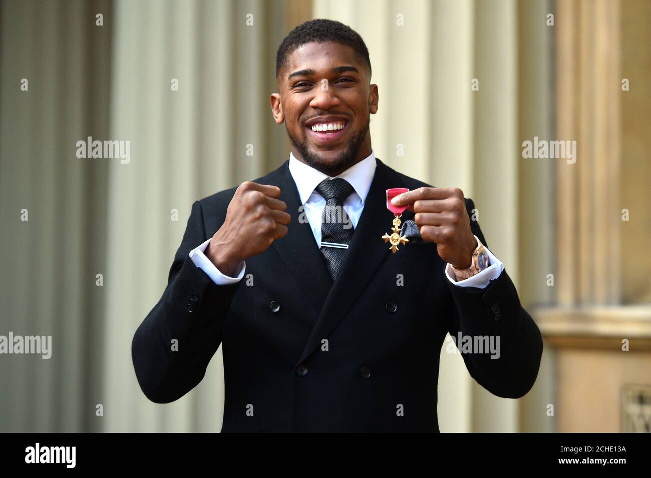 Anthony Joshua with his OBE, presented to him by the Prince of Wales ...
