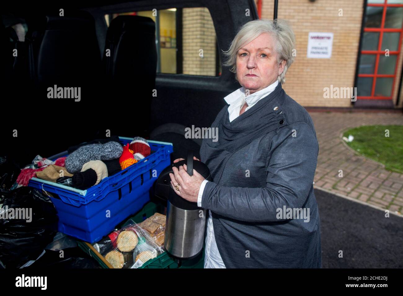 Sandra Moore, chief executive of The Welcome Organisation holding a hot ...