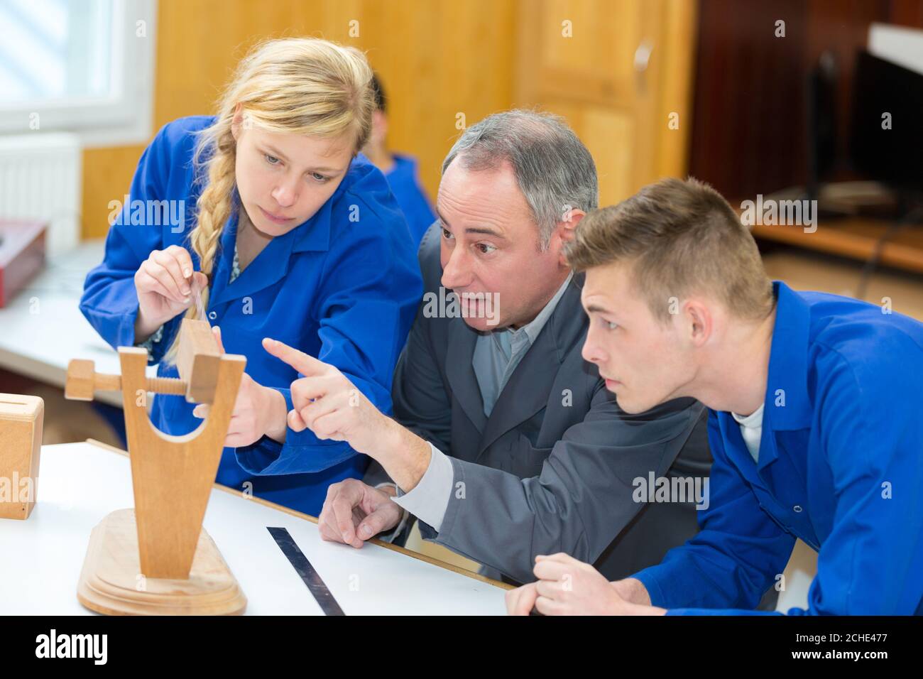 Instruction in woodworking hi-res stock photography and images - Alamy