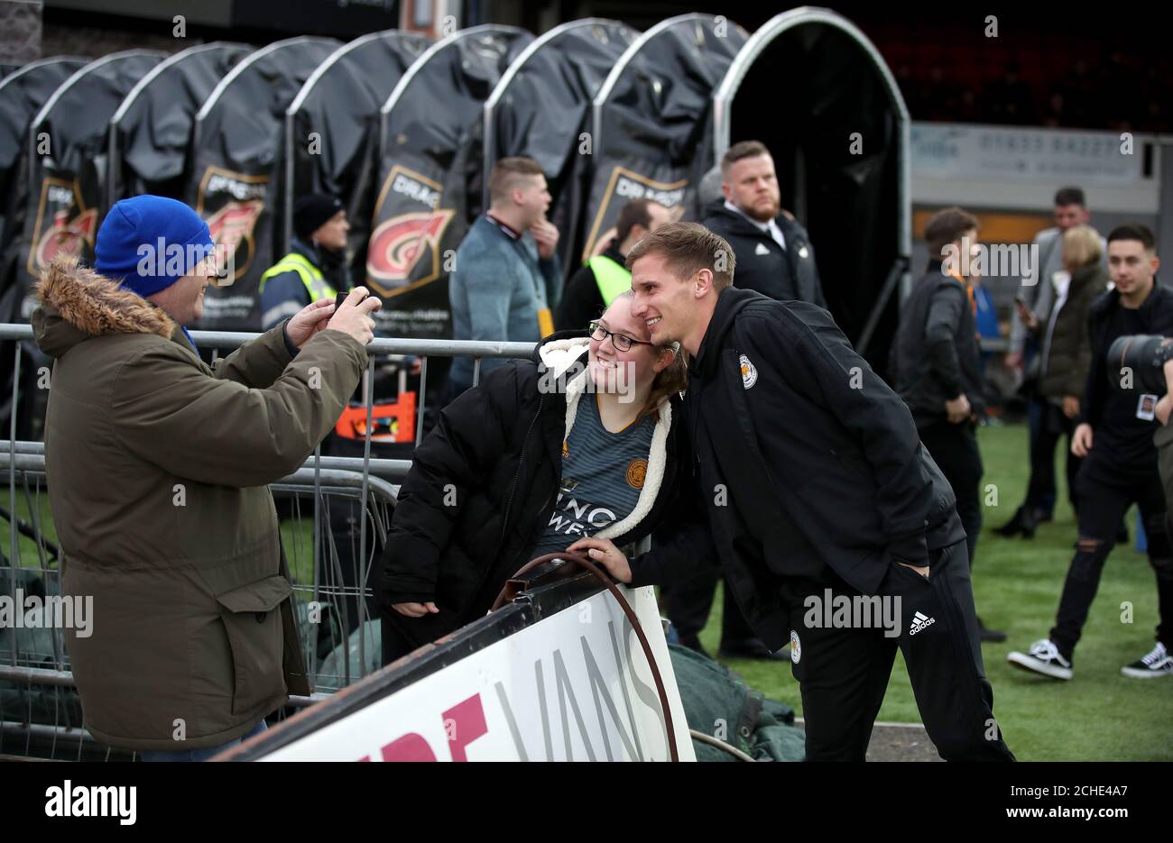 Leicester City's Marc Albrighton poses for a photograph with a fan ...