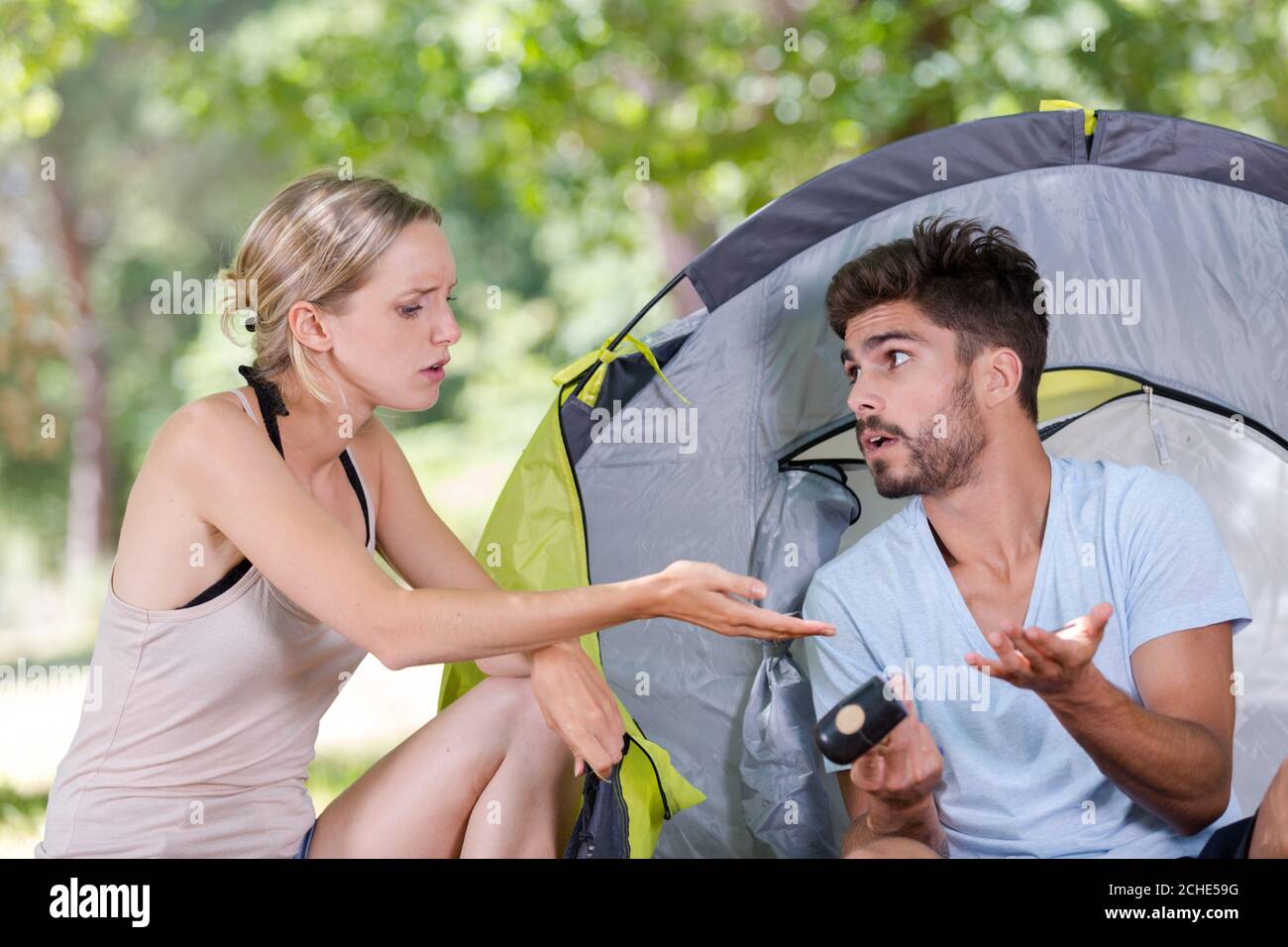 hiker couple arguing with each other in forest Stock Photo - Alamy