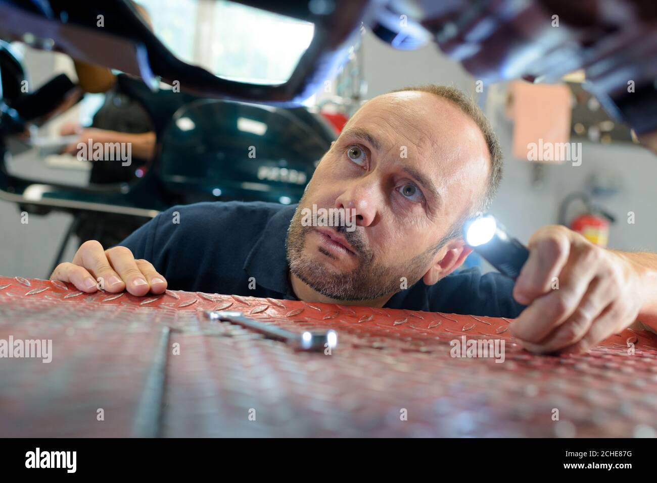 Man shining torch hi-res stock photography and images - Alamy