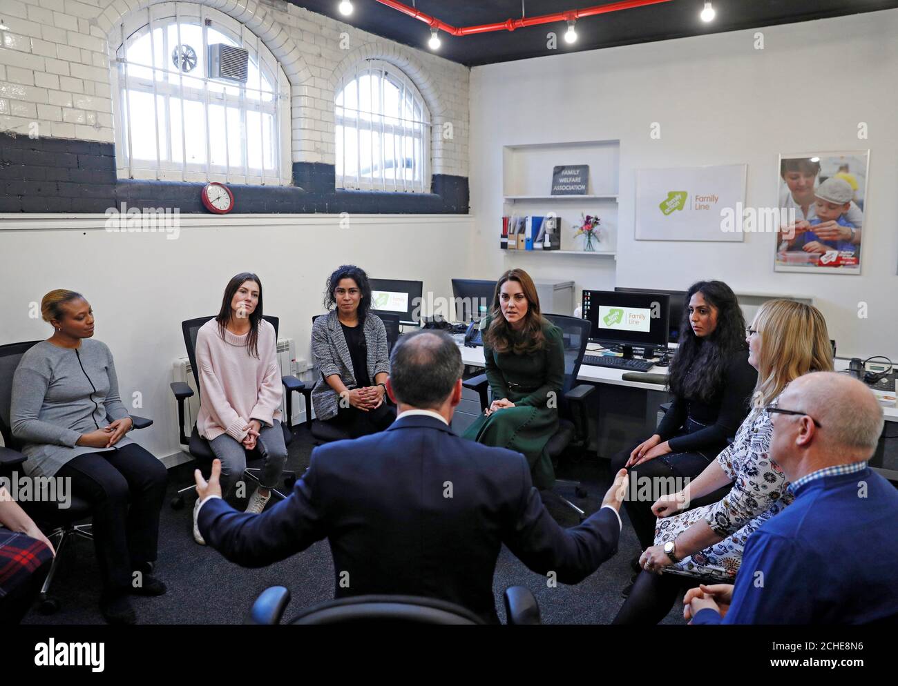 The Duchess of Cambridge (centre right) sits with counsellors during a ...