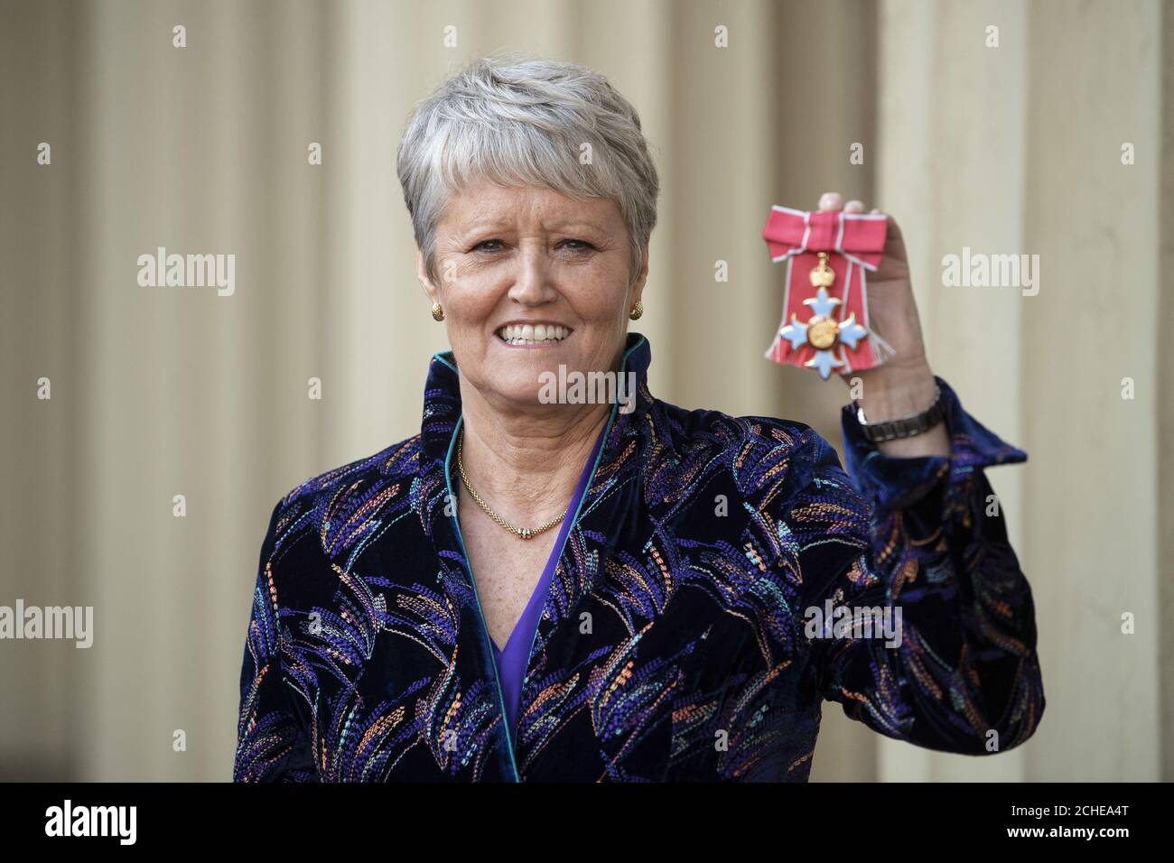 Professor Dame Susan Hill with her CBE after an investiture ceremony at ...