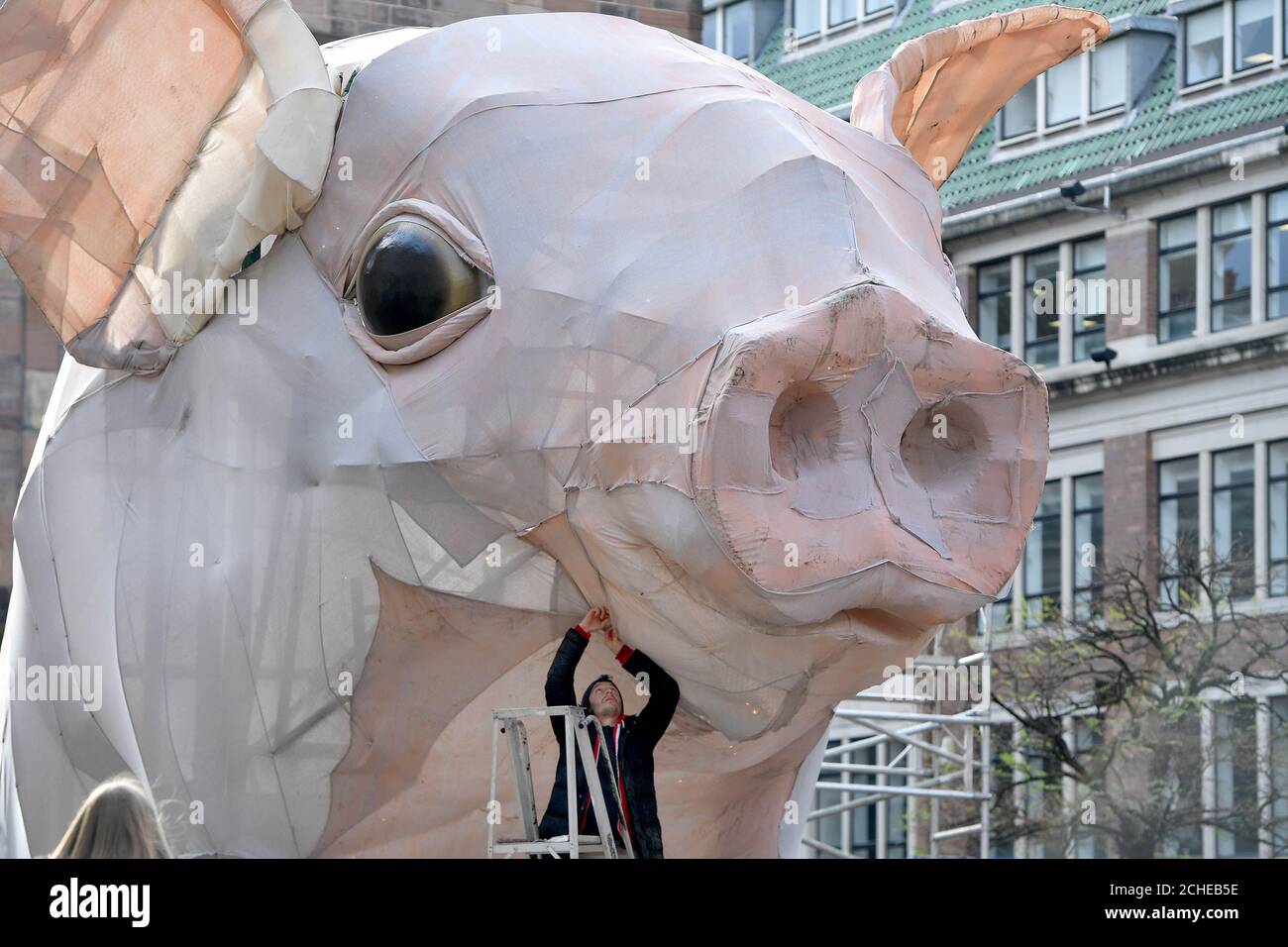 Artist alex rinsler applies finishing touches to hi-res stock ...