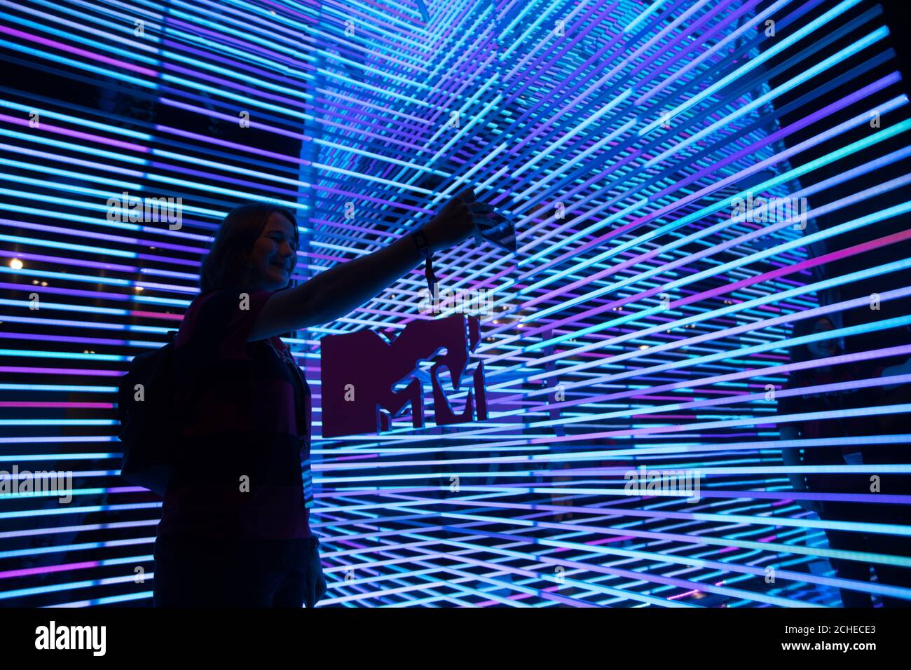 EDITORIAL USE ONLY A guest takes selfies in the MTV lightbox at the ...