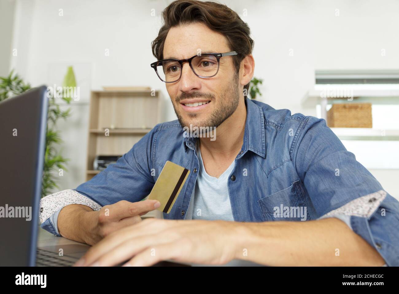 happy man buying online shopping Stock Photo - Alamy