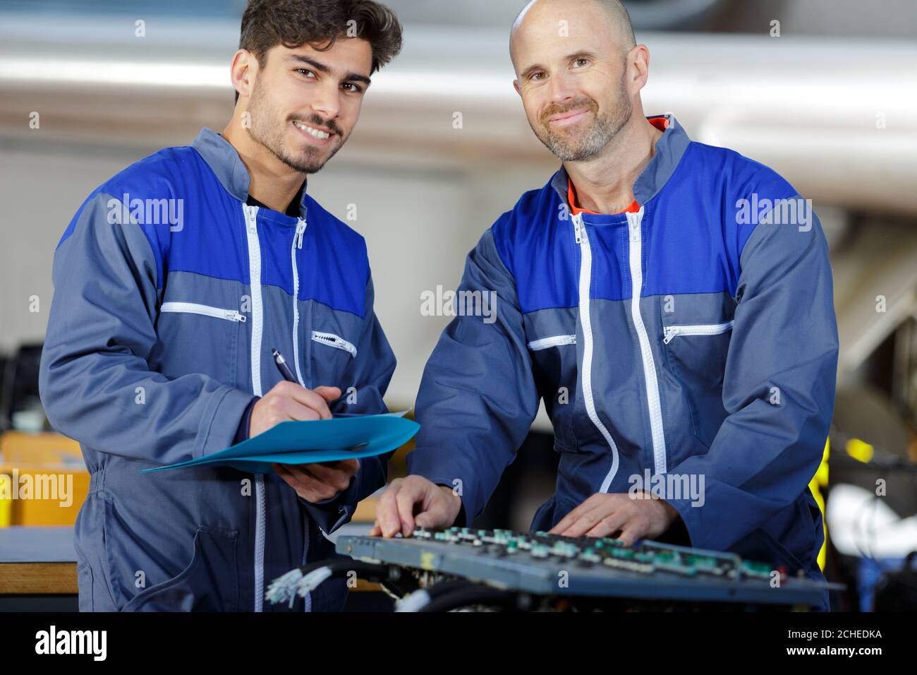 Two men checking supply hi-res stock photography and images - Alamy