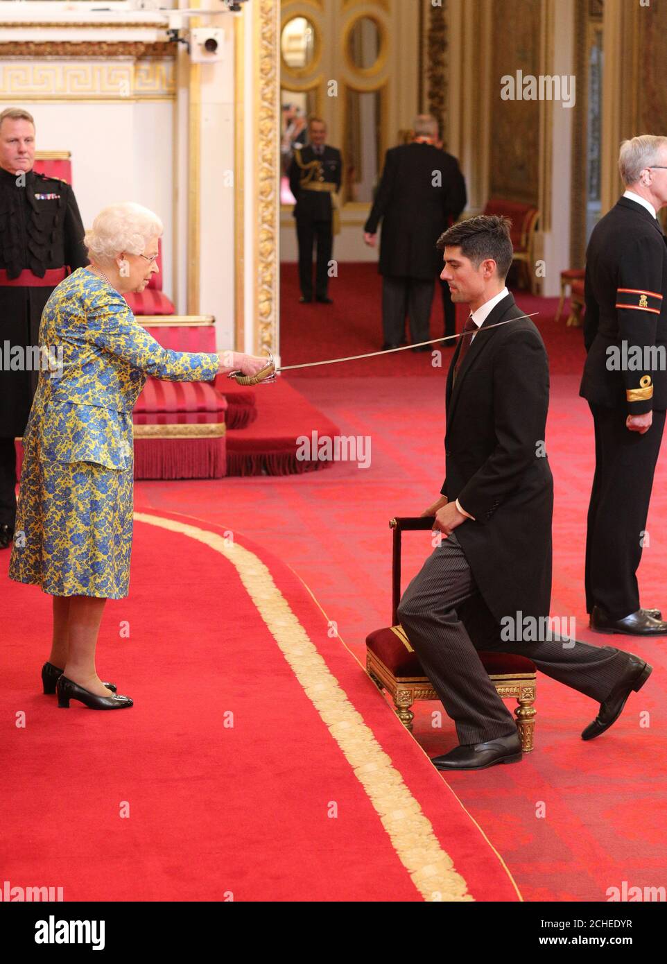 Alastair Cook receives a knighthood for services to cricket from Queen ...