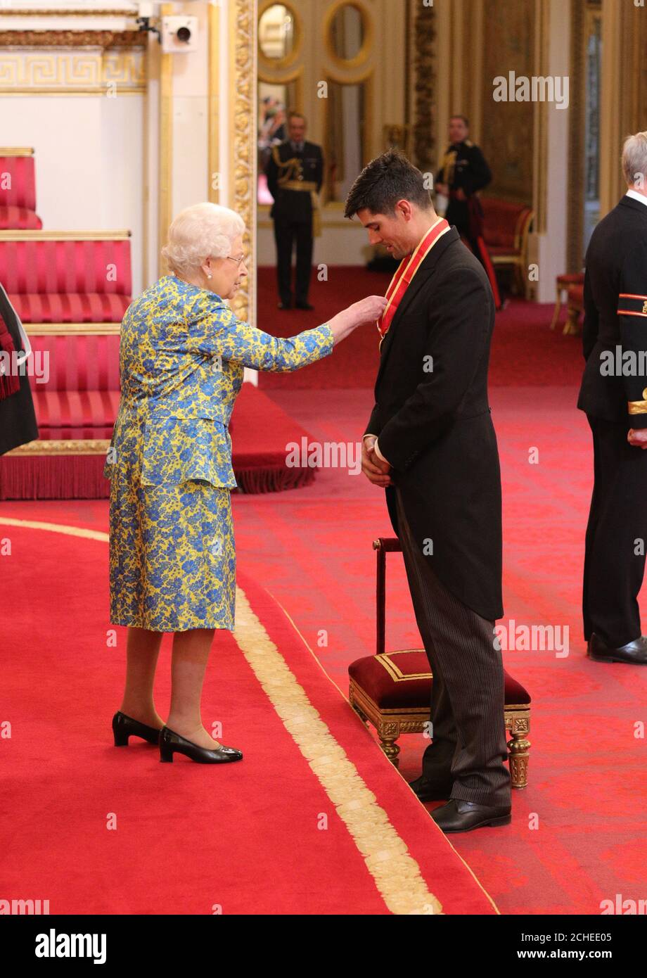 Alastair Cook receives a knighthood for services to cricket from Queen ...