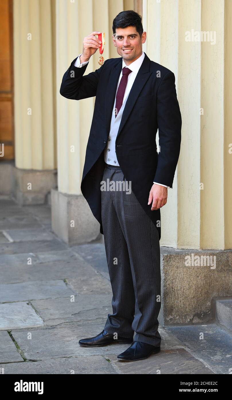 Alastair Cook with his knighthood following an investiture ceremony at ...