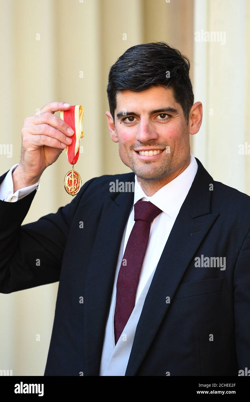 Alastair Cook with his knighthood following an investiture ceremony at ...