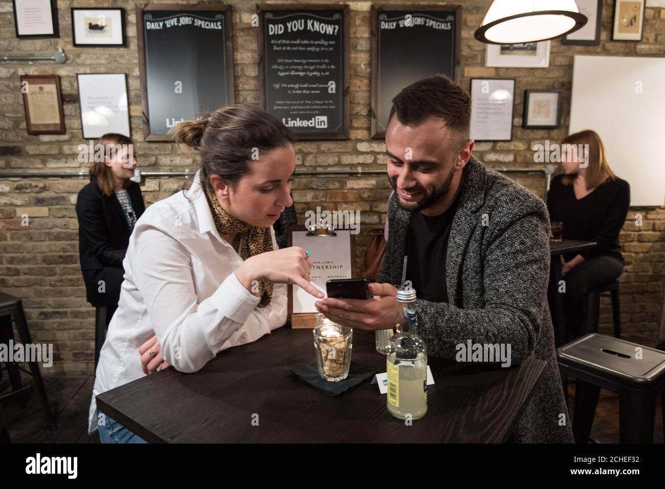 EDITORIAL USE ONLY Job-hunters enjoy an after-work drink at 'The Linked ...