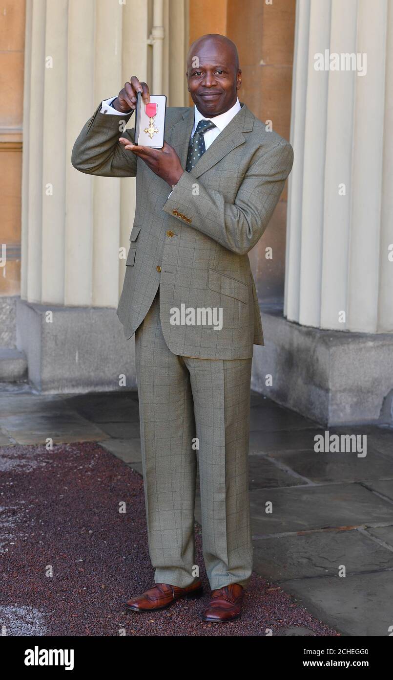 Detective Sergeant Isaac Idun with his OBE following an investiture ...