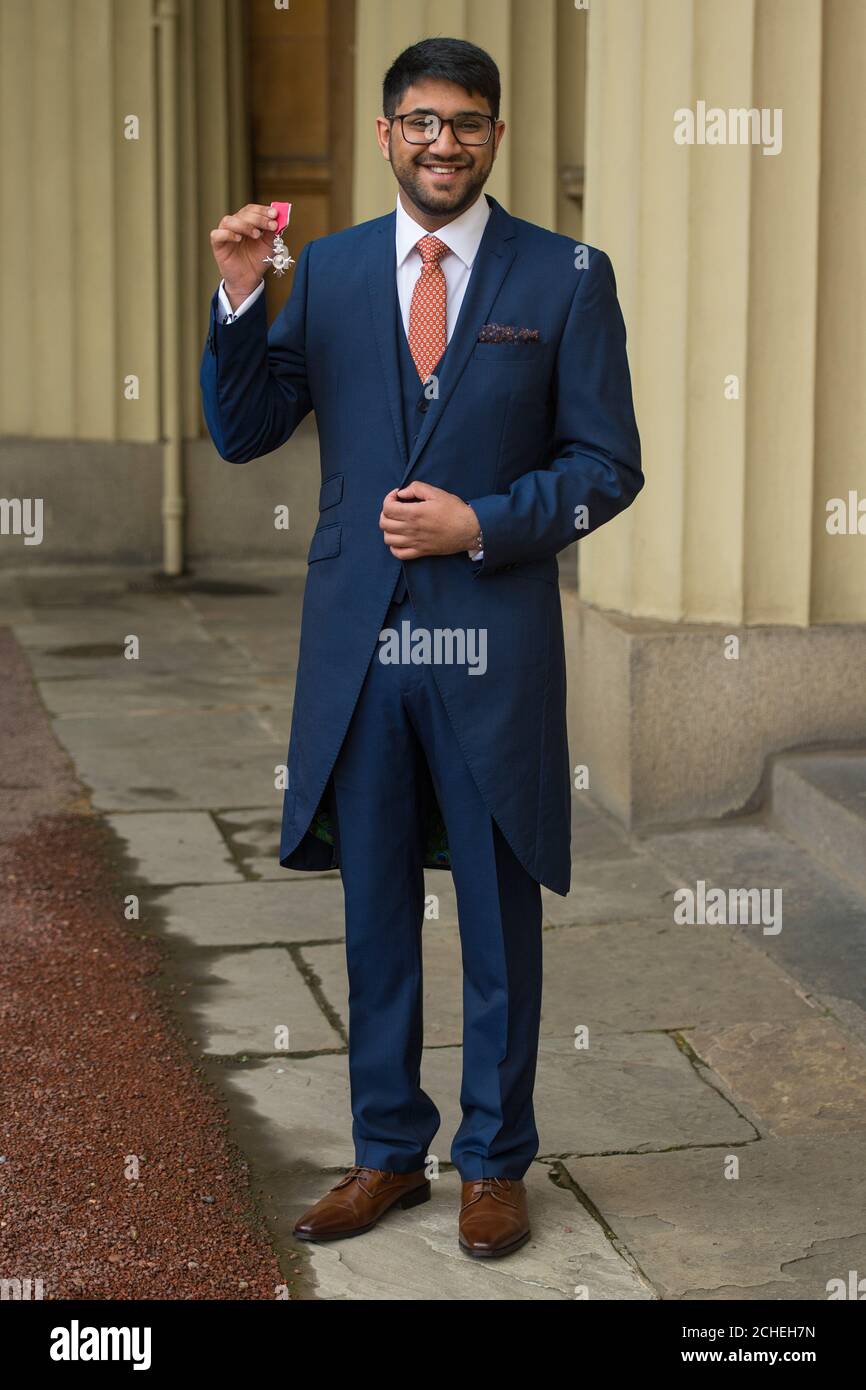 Saeed Atcha with his MBE medal, awarded to him during an investiture ...