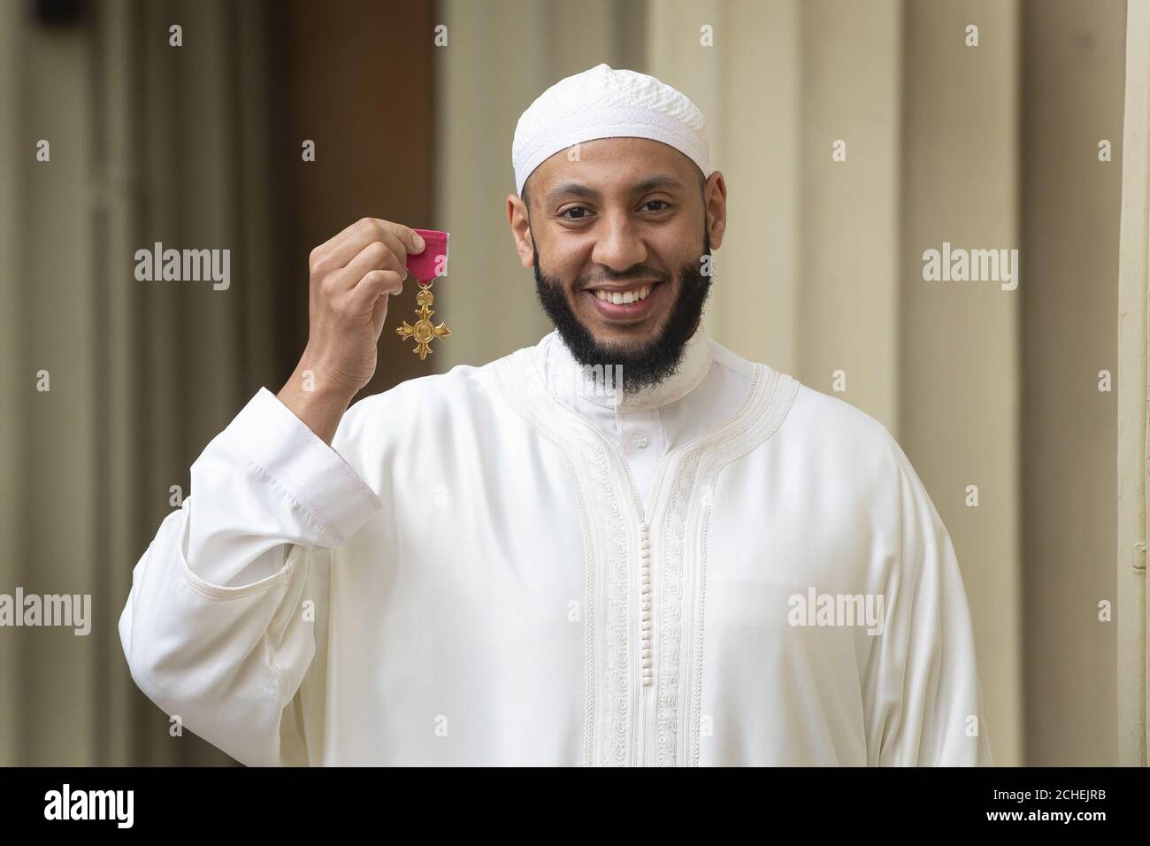 Imam Mohamed Mahmoud with his OBE for services to the community of ...