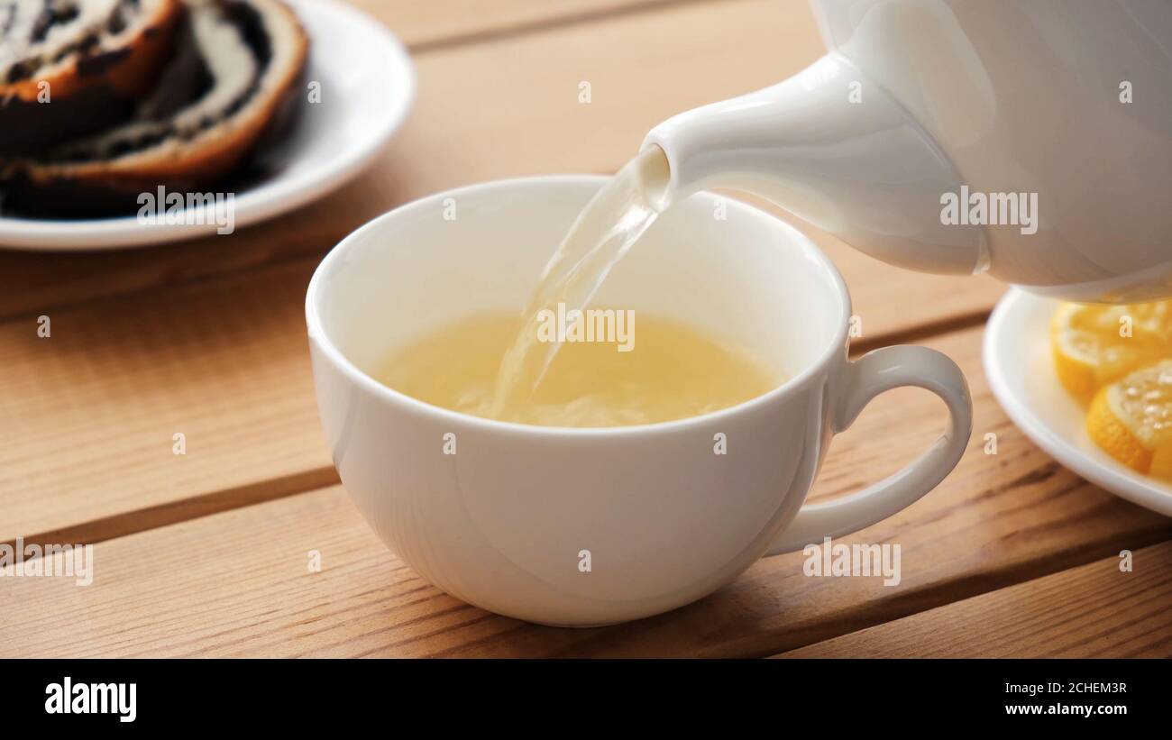 Green tea pouring in glass hi-res stock photography and images - Alamy