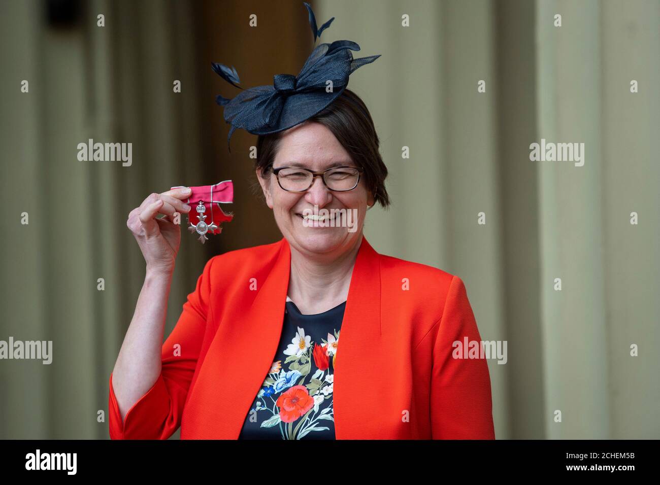 RETRANSMISSION, correcting honour to MBE. Helen Clarke with her MBE for ...