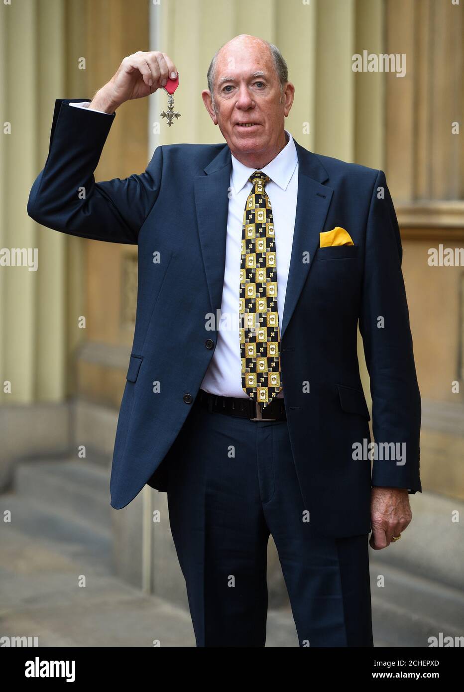 Darts player John Lowe with his MBE for services to Darts and to ...