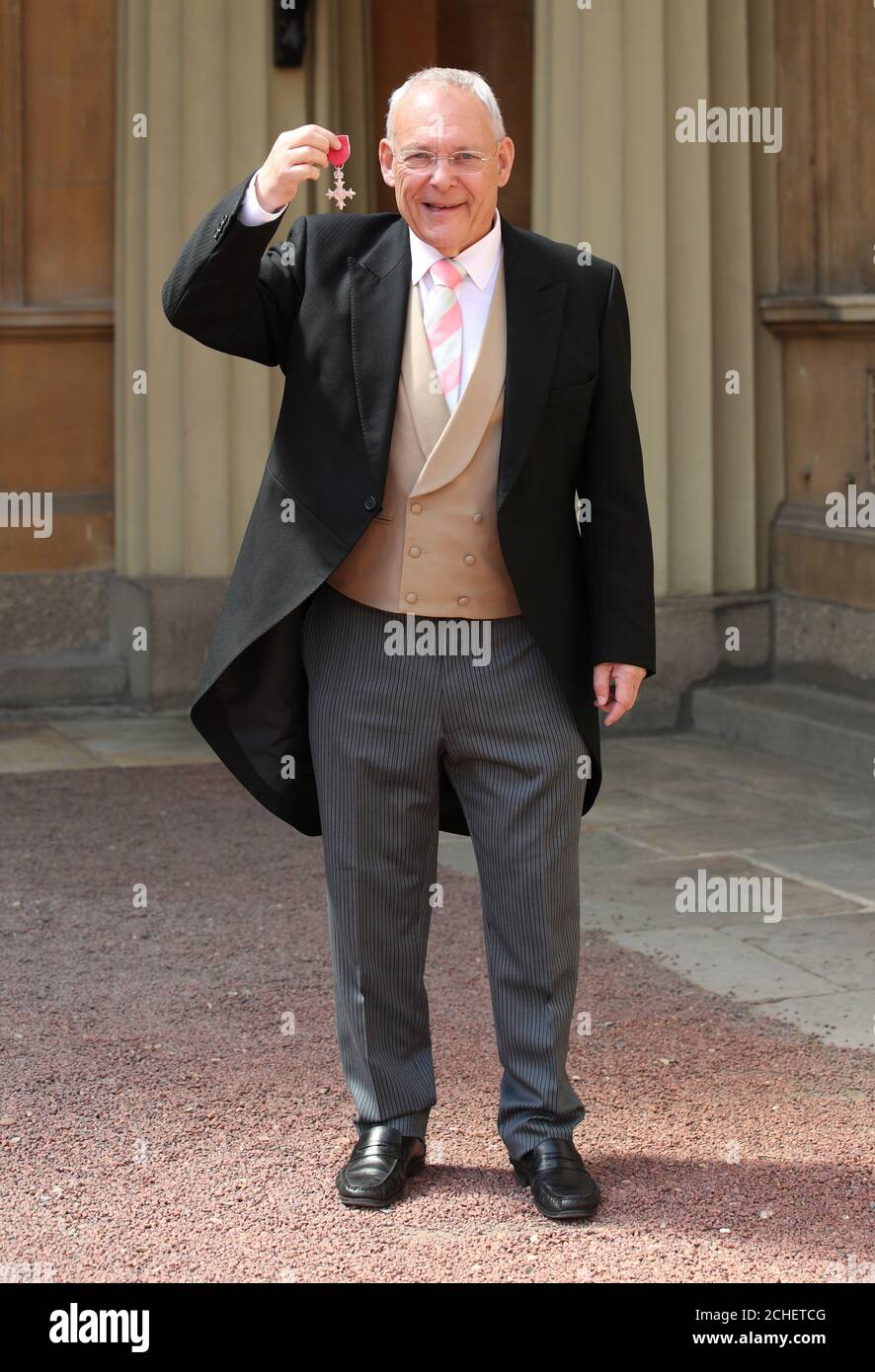 Gary Newbon with his MBE following an investiture ceremony at ...