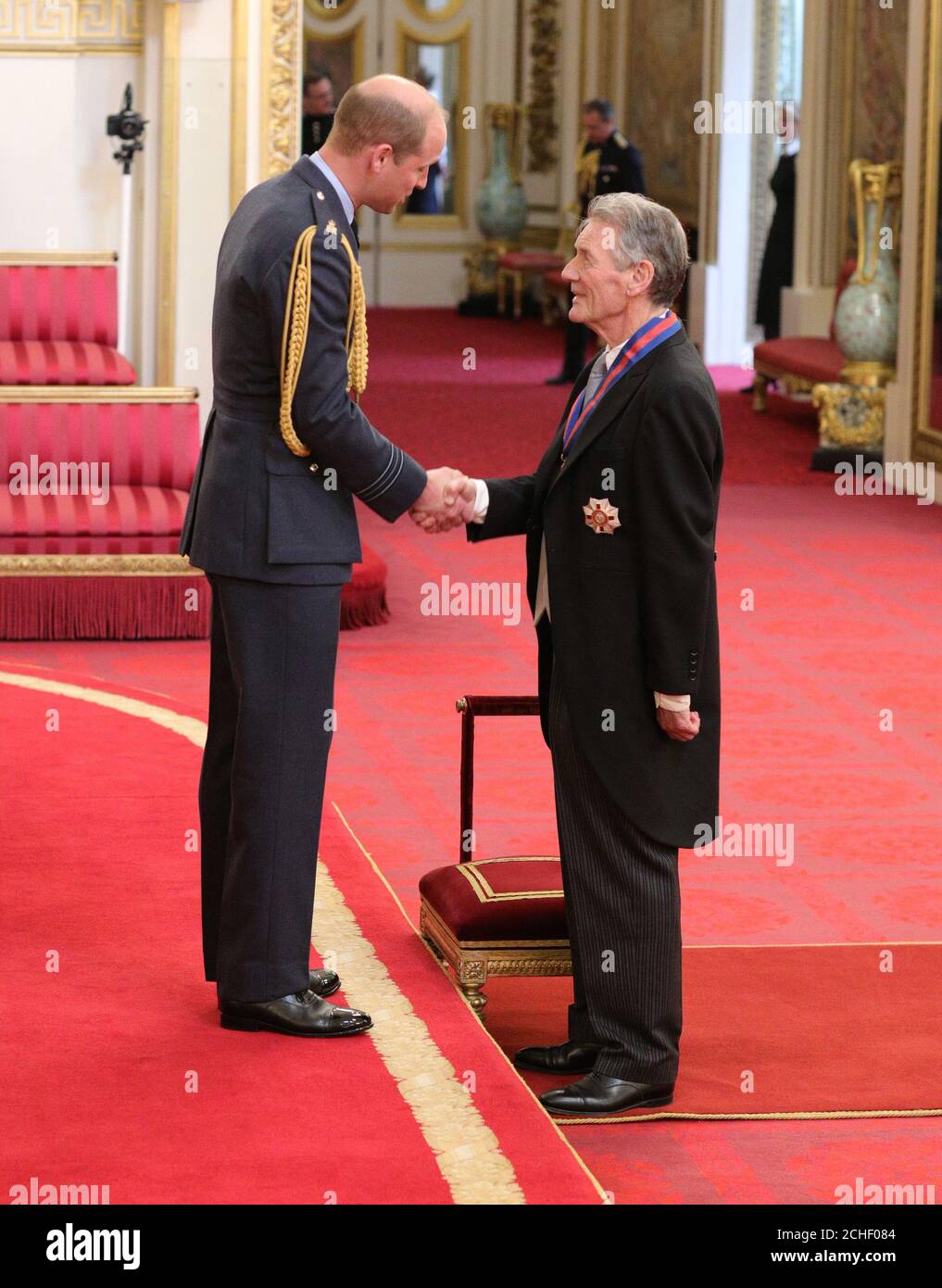 Sir Michael Palin from London after being made a Knight Commander of ...