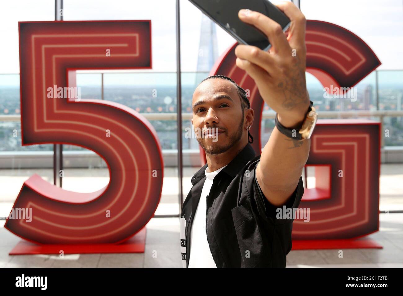 EDITORIAL USE ONLY Lewis Hamilton attends the official switch-on of ...